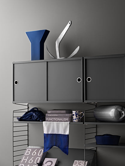 String System Cabinet with Sliding Doors by String – Really Well Made