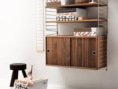String System Cabinet with Sliding Doors by String – Really Well Made