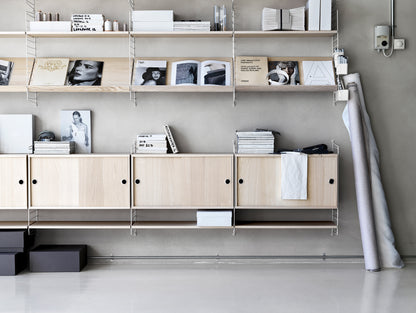 String System Cabinet with Sliding Doors by String – Really Well Made